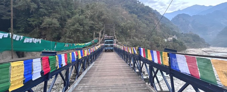 BRO connects Upper Dzongu with a 400-ft bailey suspension bridge ...